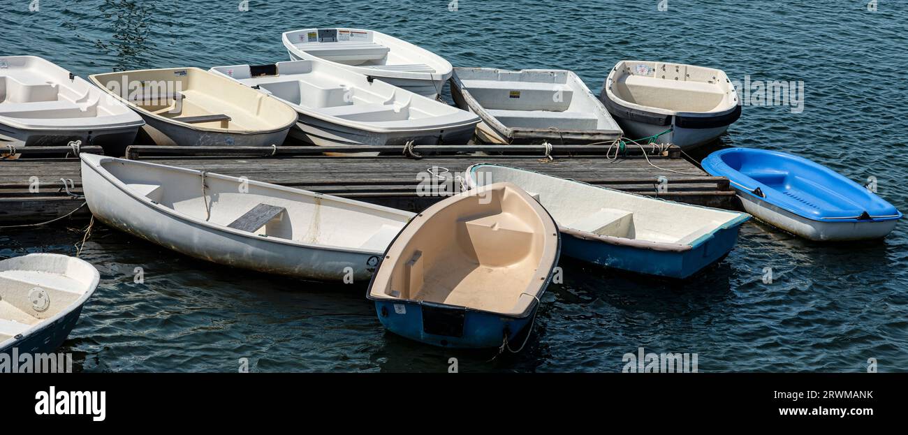 Rowboats tethered to a dock in Pamet Harbor Stock Photo - Alamy