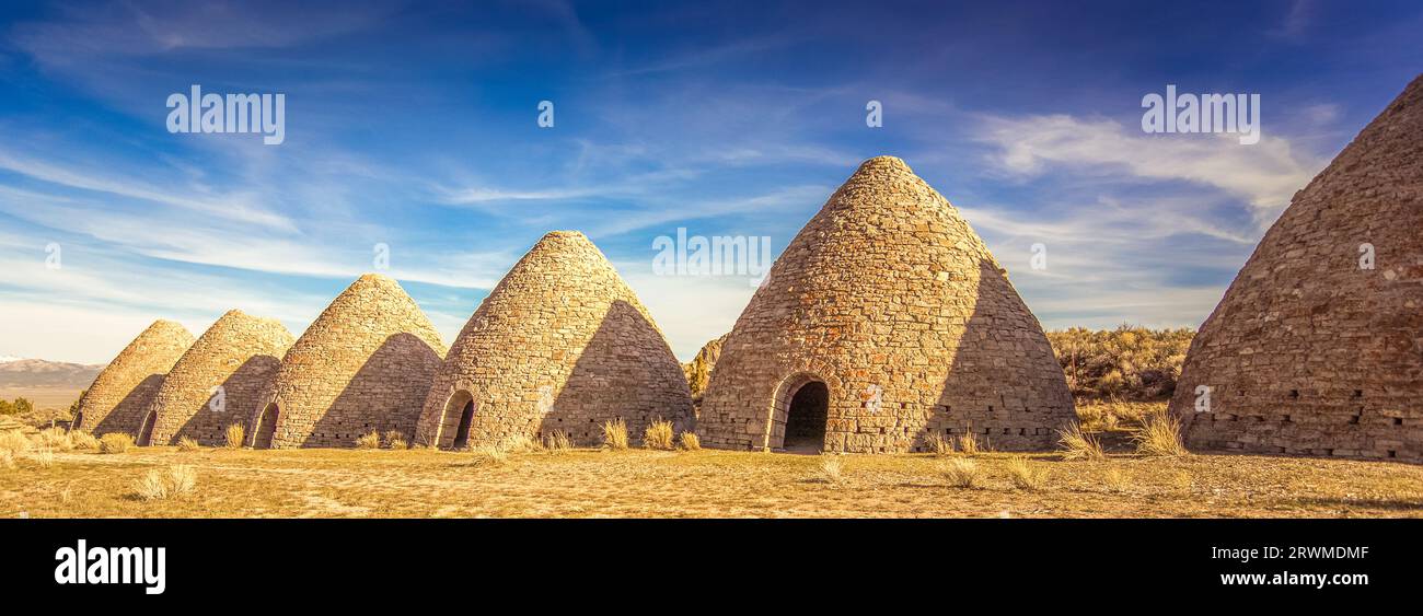 A side view of a row of traditional stone buildings nestled together on ...