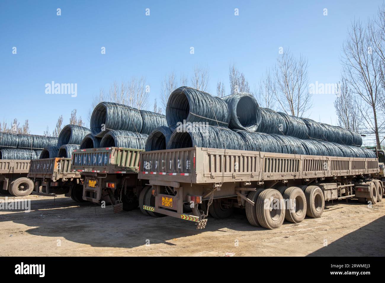 Bundles of steel bars piled up on the car Stock Photo - Alamy