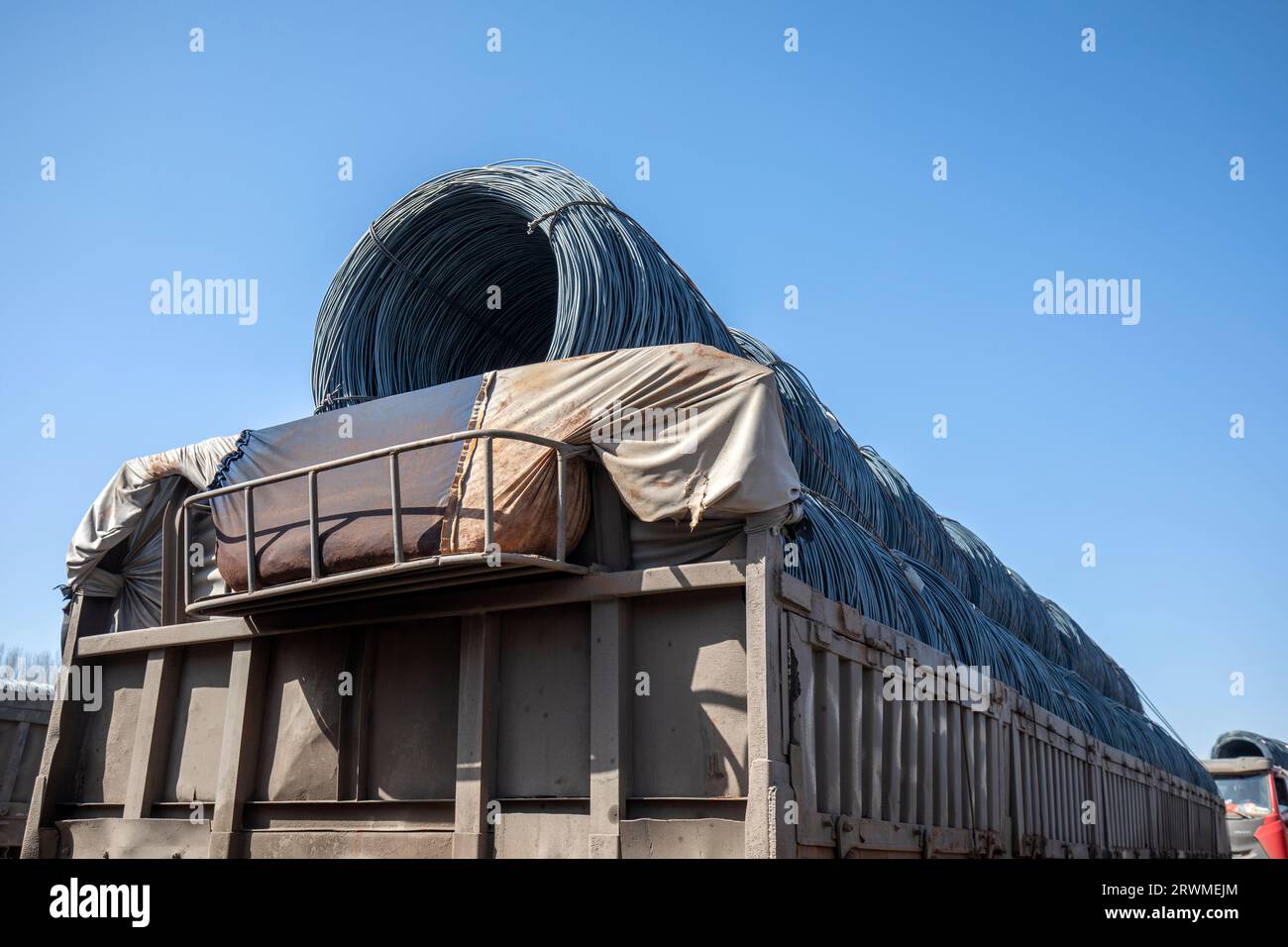 Bundles of steel bars piled up on the car Stock Photo - Alamy