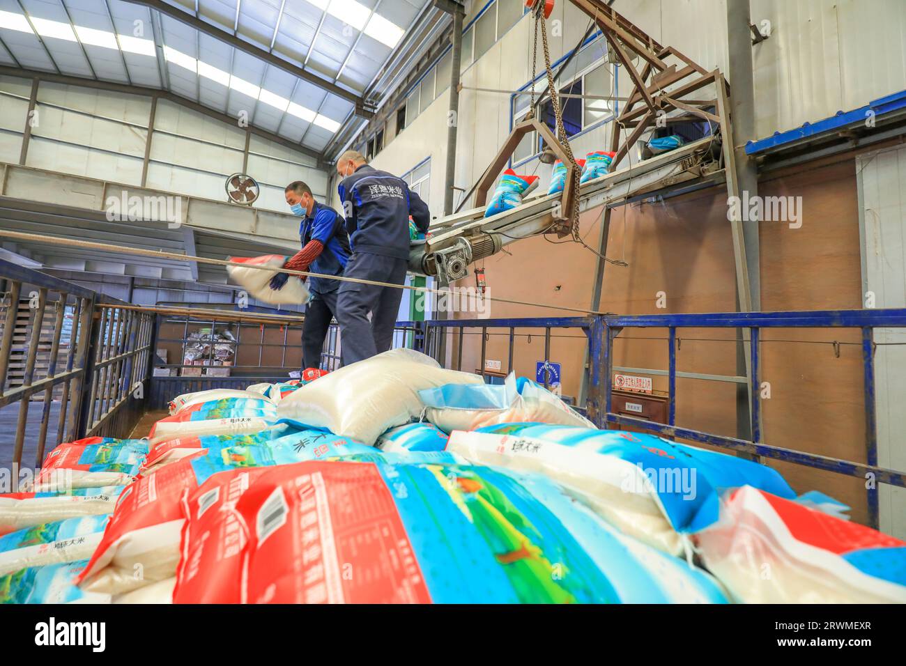 LUANNAN COUNTY, China - March 28, 2022: Workers are shipping high ...