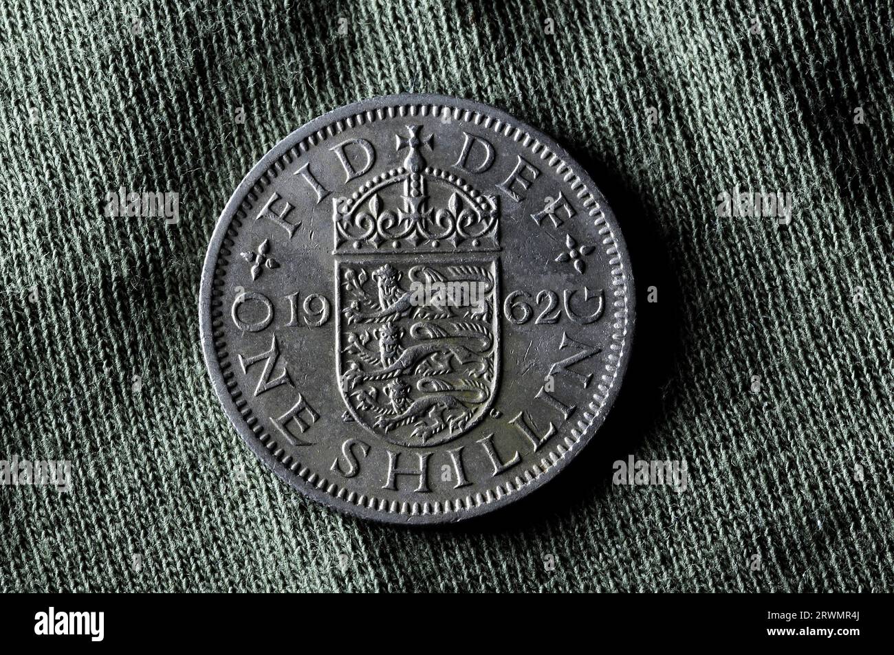 One shilling coin of pre-decimal currency, pounds, shillings and pence ...