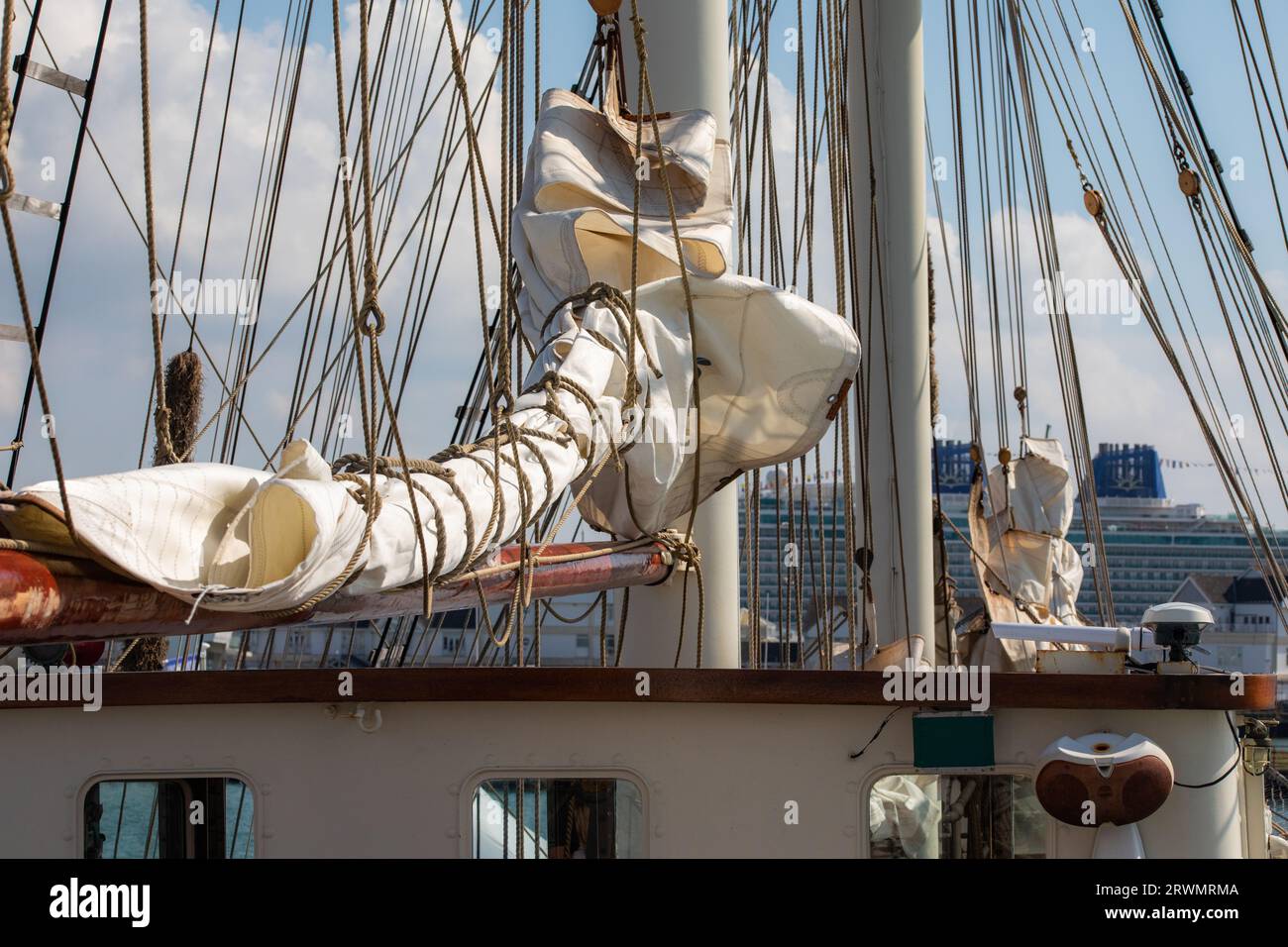 Yacht with folded sails hi-res stock photography and images - Alamy
