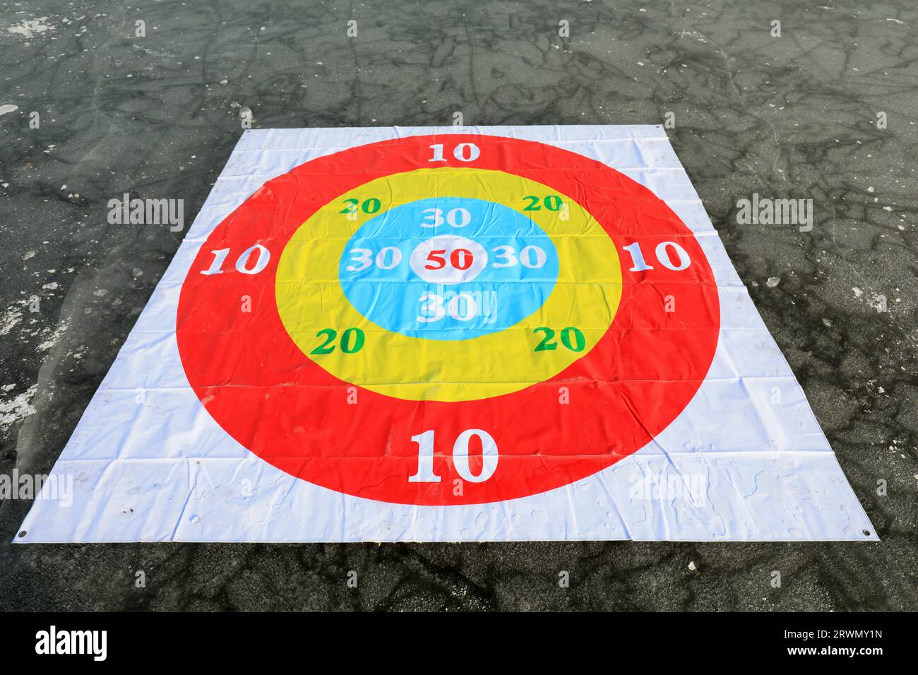 The target of the sandbag throwing competition is on the ice, North ...