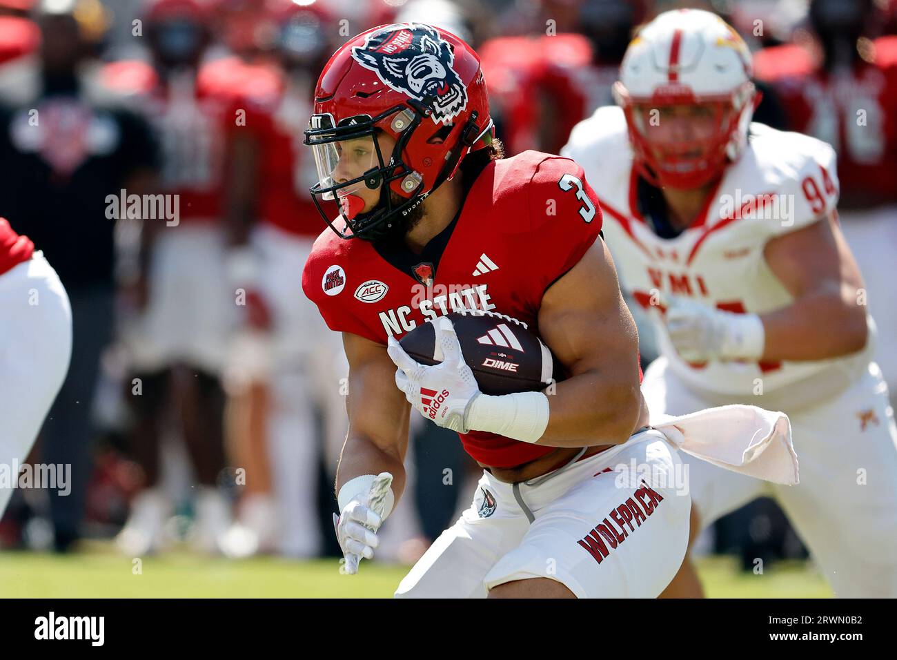 North Carolina State's Jordan Houston (3) runs the ball against VMI ...