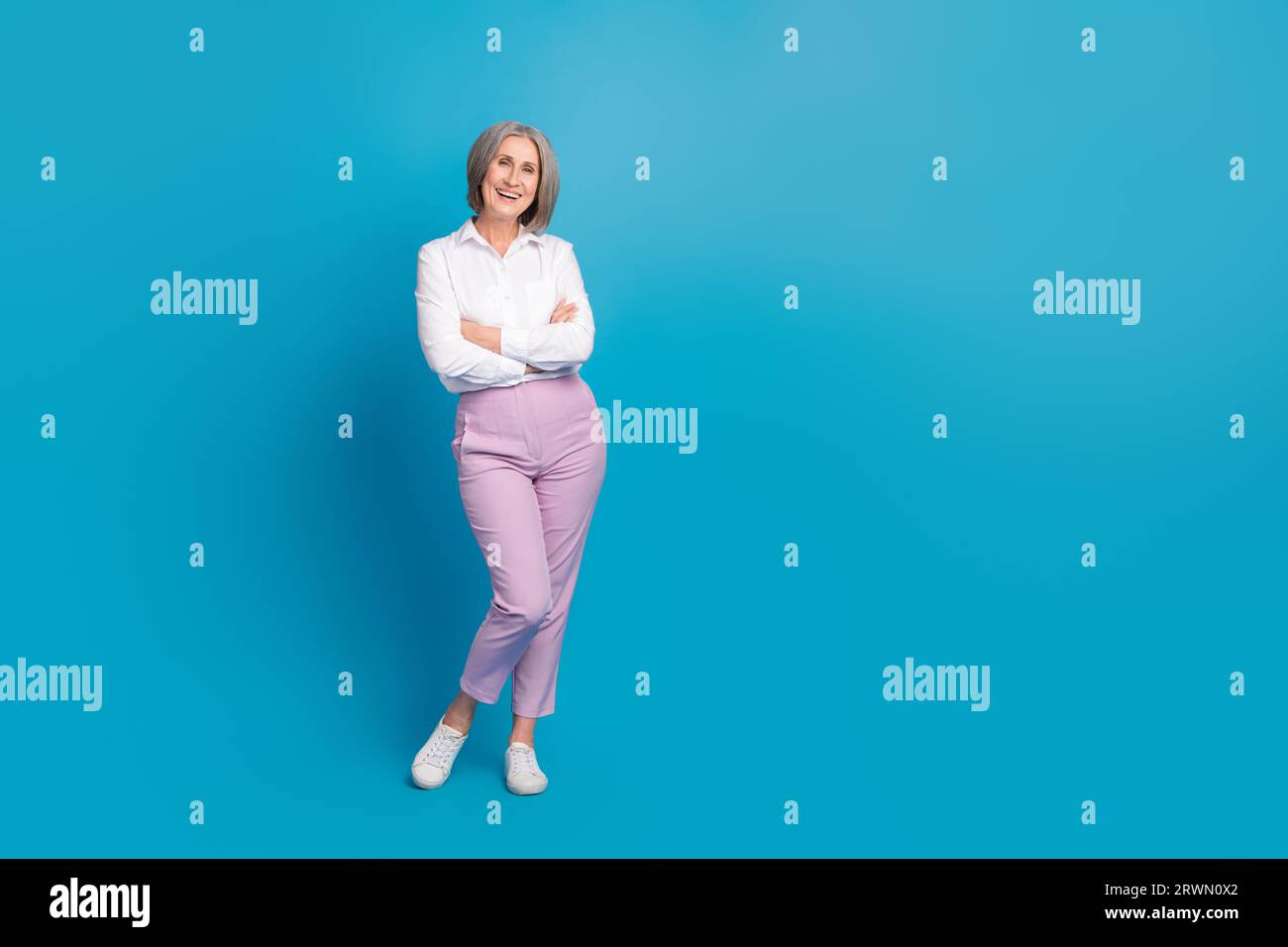 Full body photo of cheerful corporate agent lady folded arms posing ...