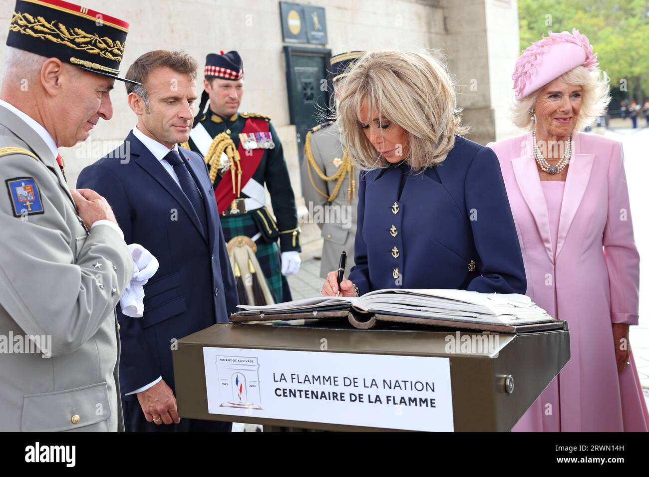 Brigitte Macron signs the 'Livre d'Or' or the 'Golden Book' during a ...