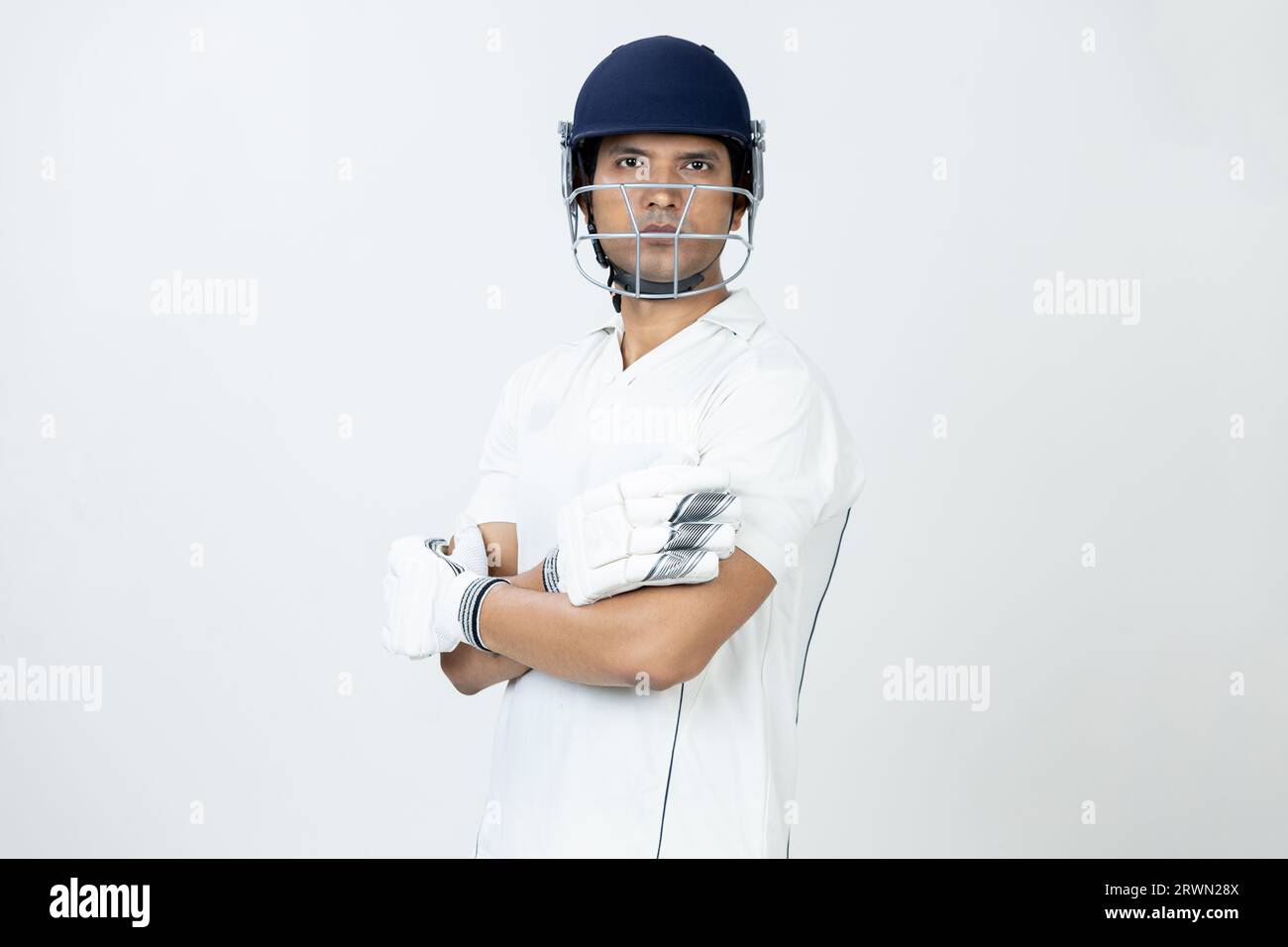 portrait of Man in cricketer dress looking towards the camera Stock ...
