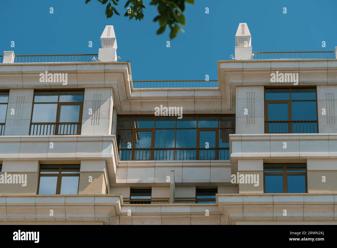 New building facade in housing complex. Modern style in architecture ...