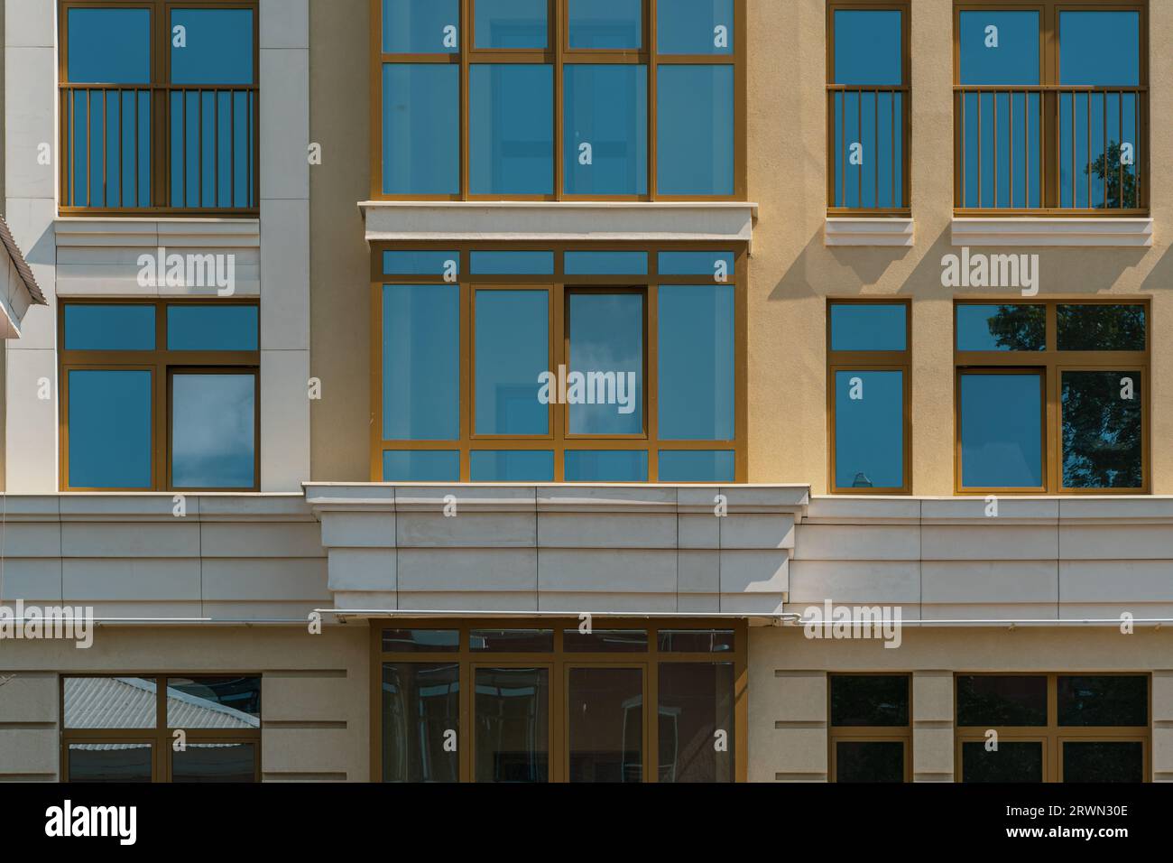 New building facade in housing complex. Modern style in architecture ...