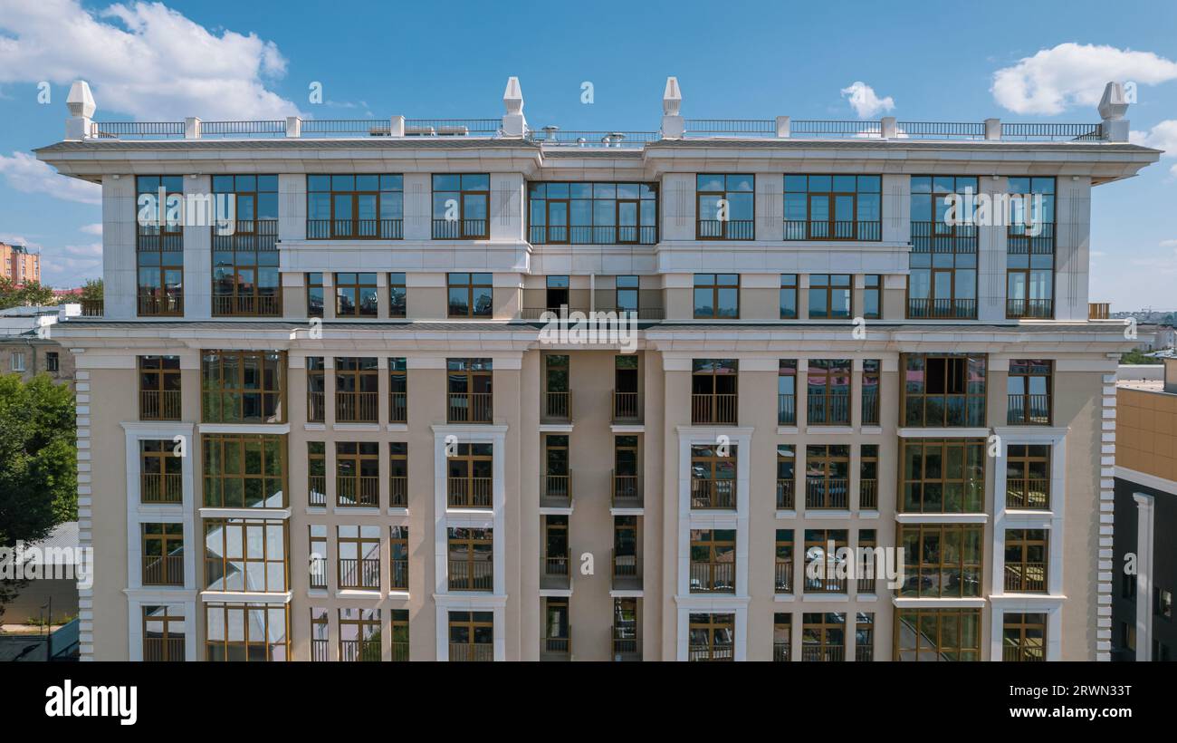 New building facade in housing complex. Modern style in architecture ...