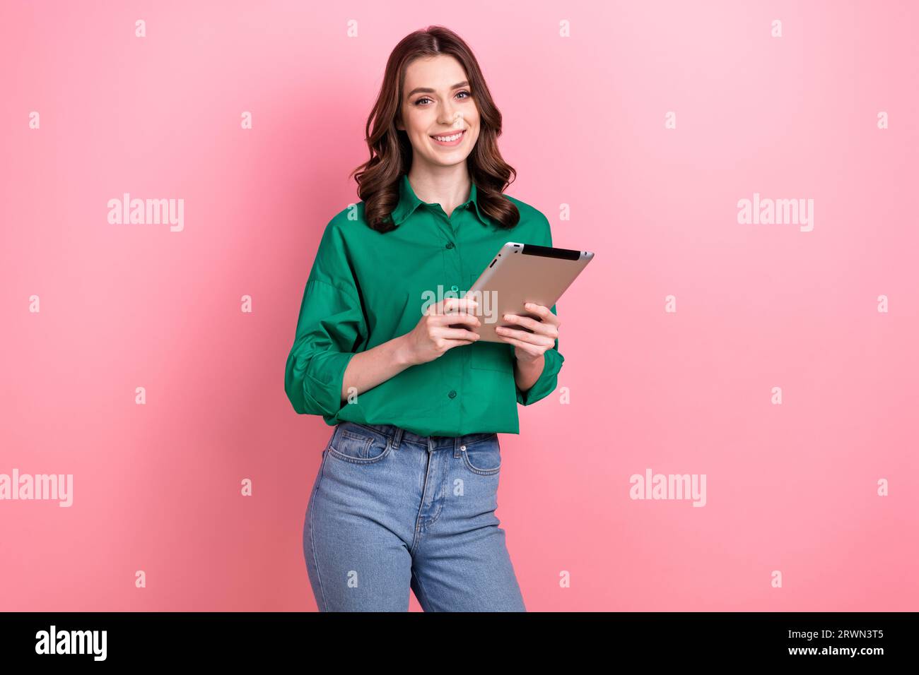 Photo of positive pretty lady wear green shirt typing apple samsung ...