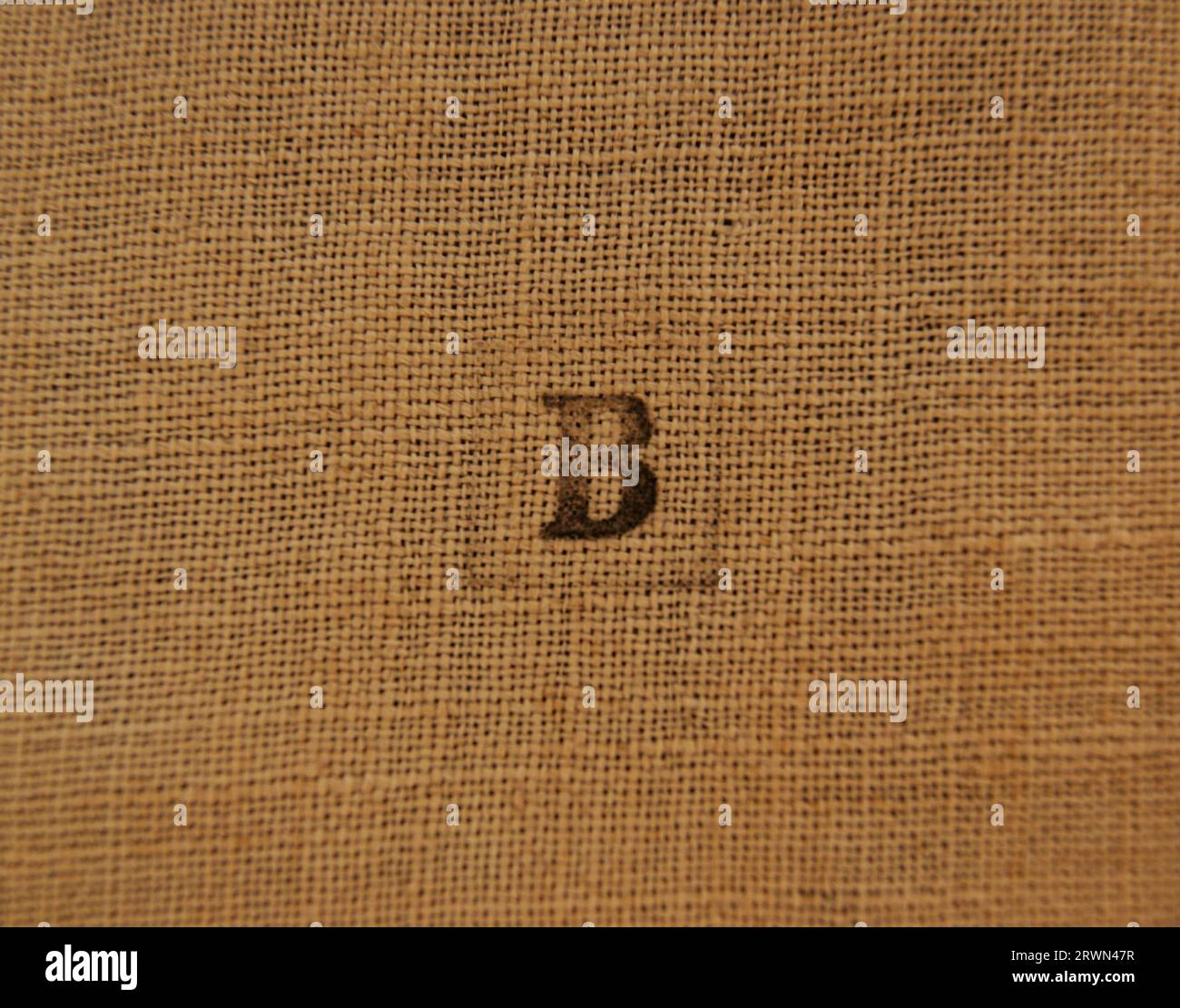 Letter B. Stamp letters on linen fabric Stock Photo - Alamy