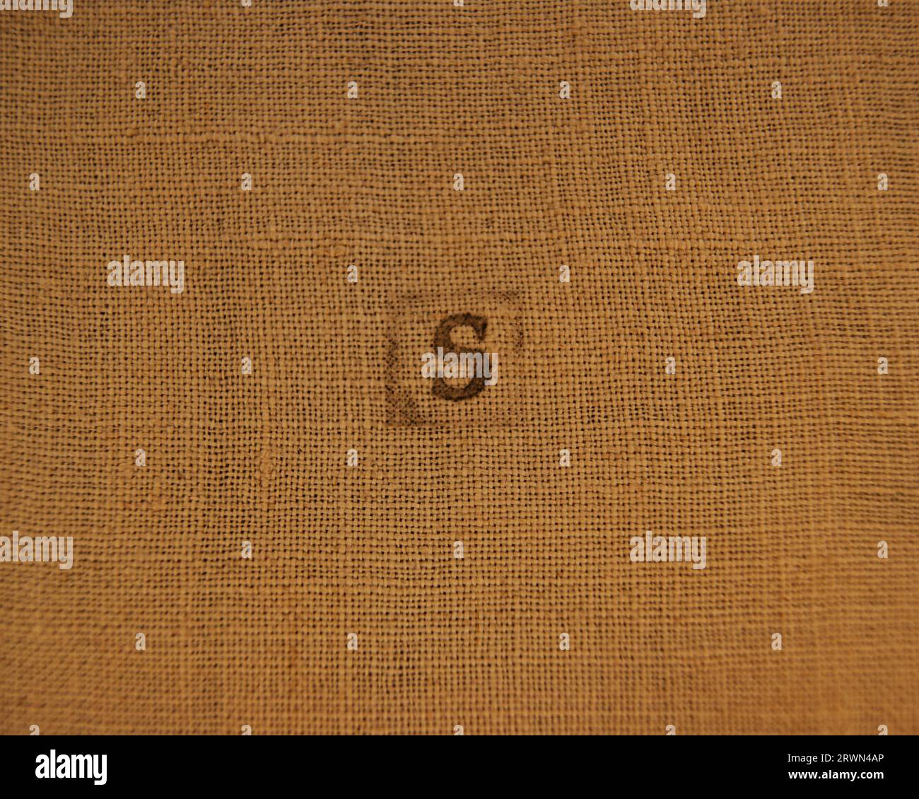 Letter S. Stamp letters on linen fabric Stock Photo - Alamy