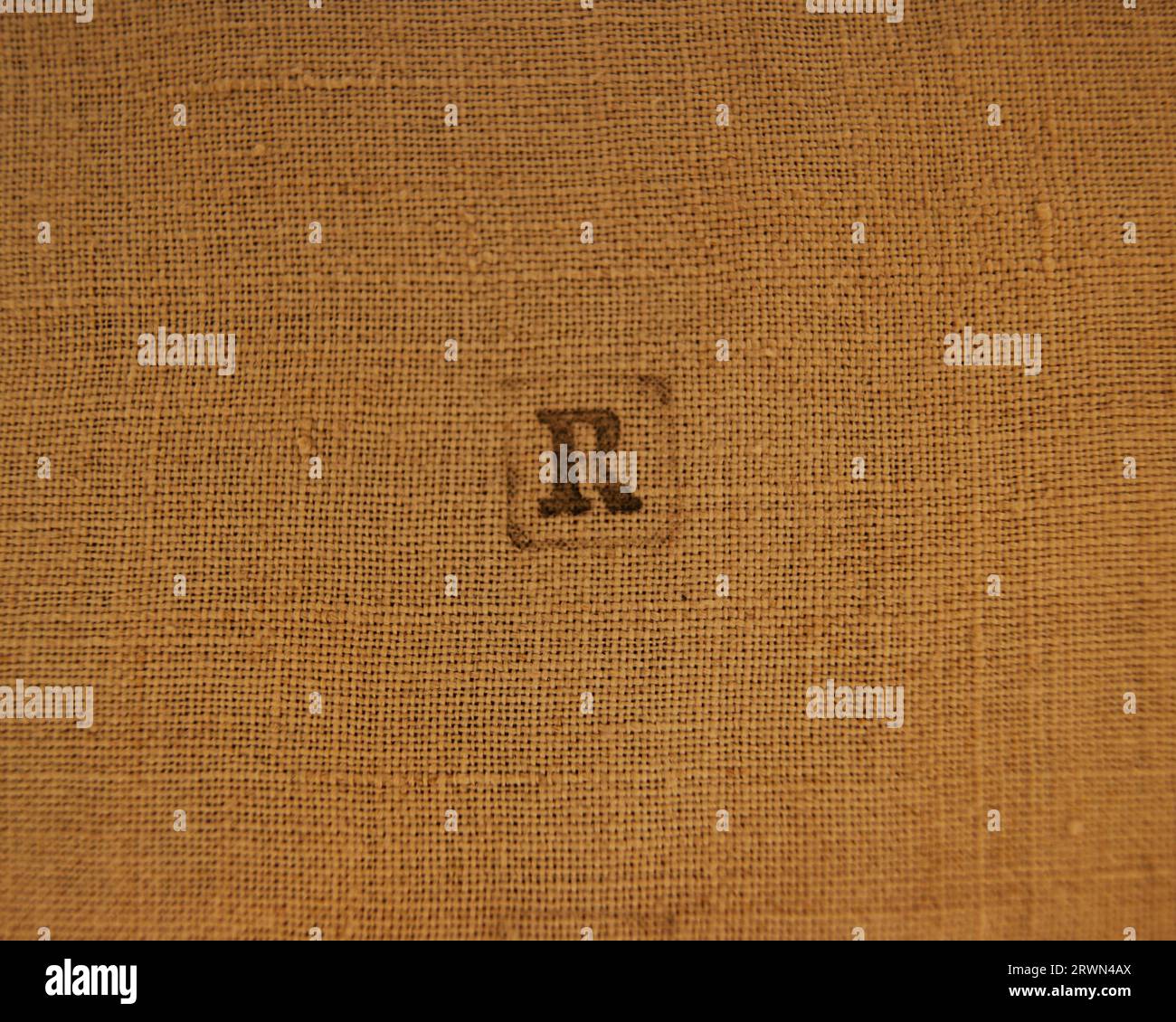 Letter R. Stamp letters on linen fabric Stock Photo - Alamy