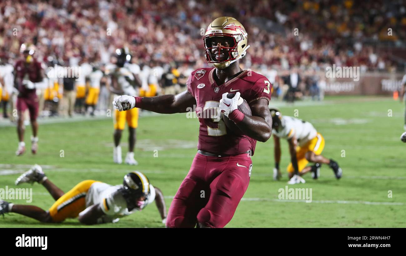 Florida State running back Trey Benson (3) runs for a touchdown in the ...