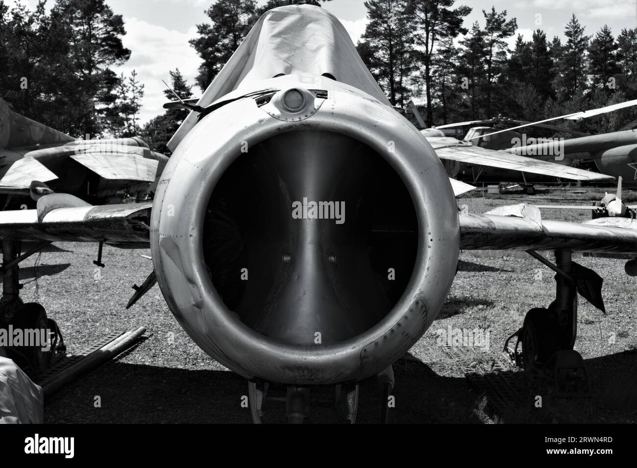 An old Soviet era fighter MIG 15. View from the front. Black and white ...