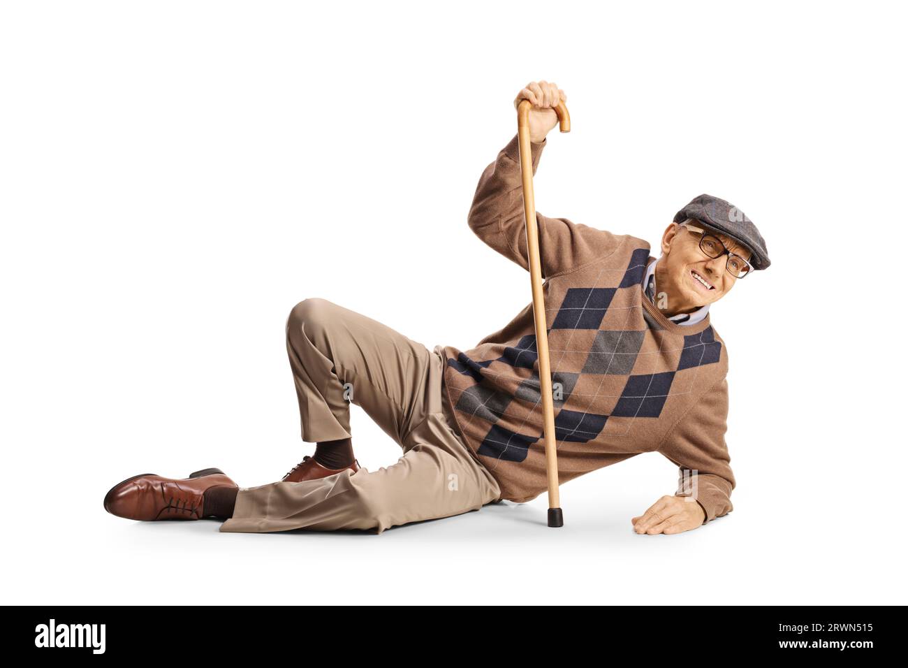Elderly man with a walking cane falling on the ground isolated on white ...