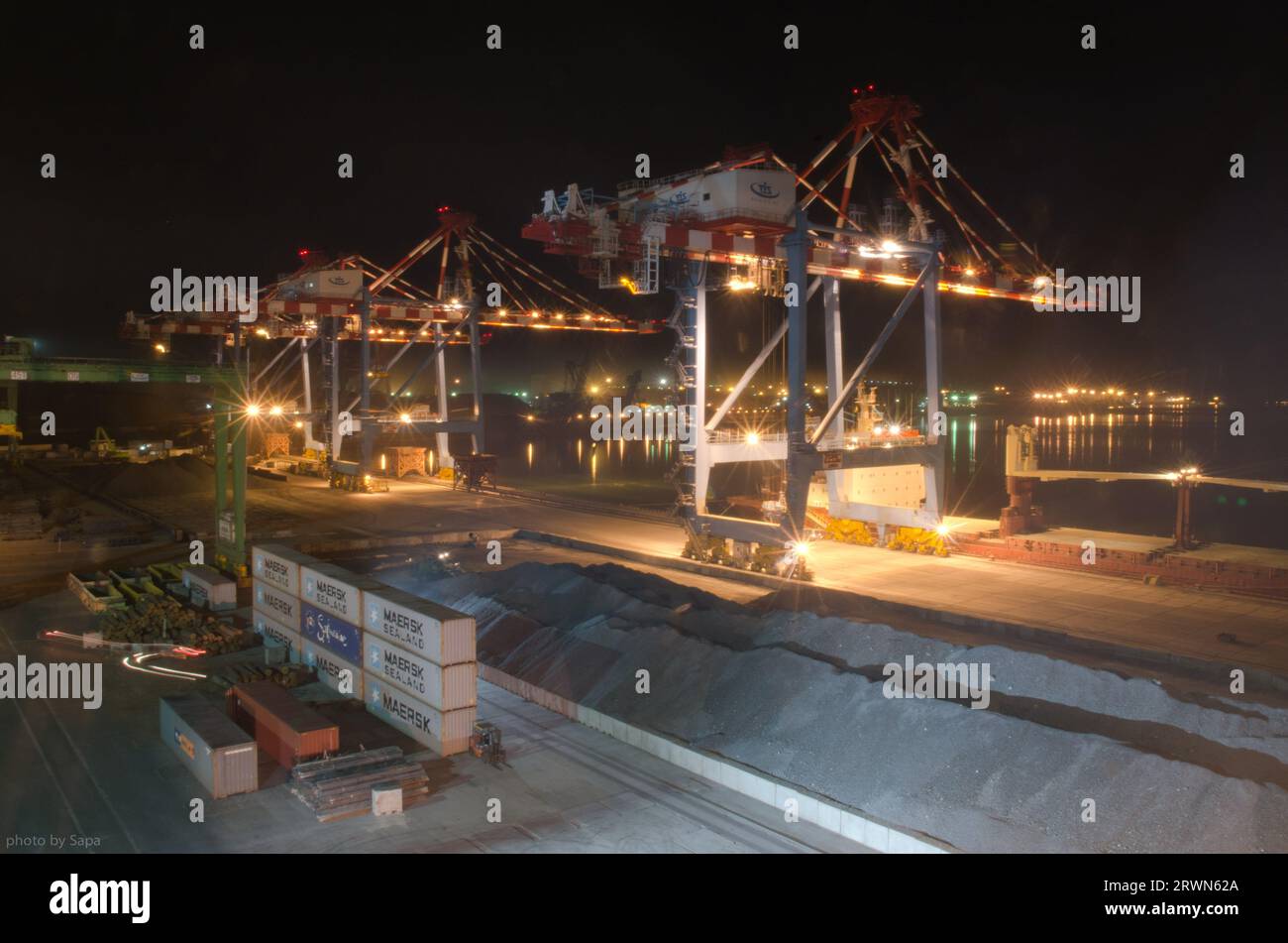 Container terminal. Sea port container terminal during work at night in ...