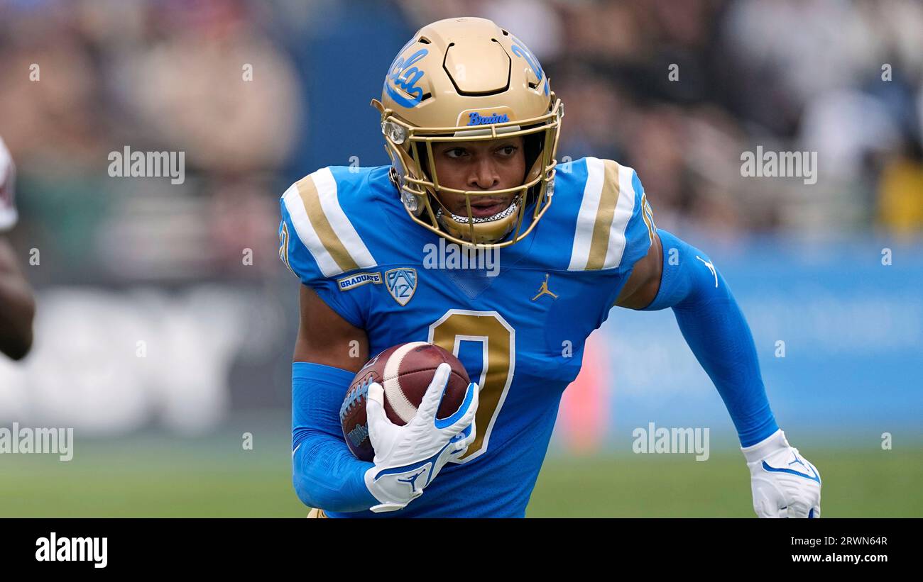 UCLA wide receiver Kam Brown, right, runs a pass in for a touchdown ...