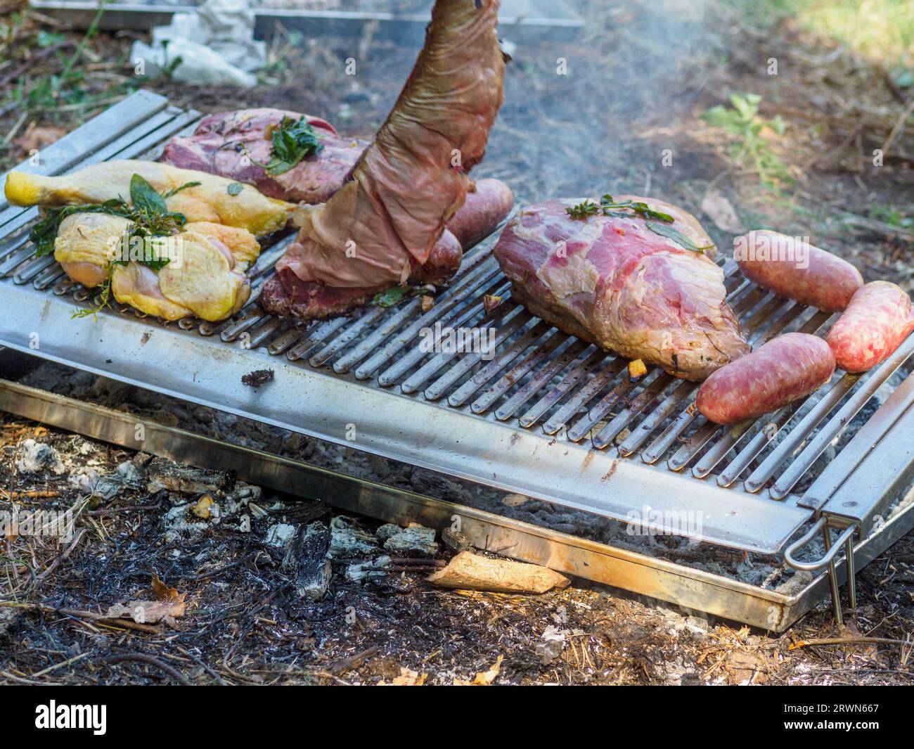 grilling chorizo sausages , chicken quarters, skirt steaks, flank ...