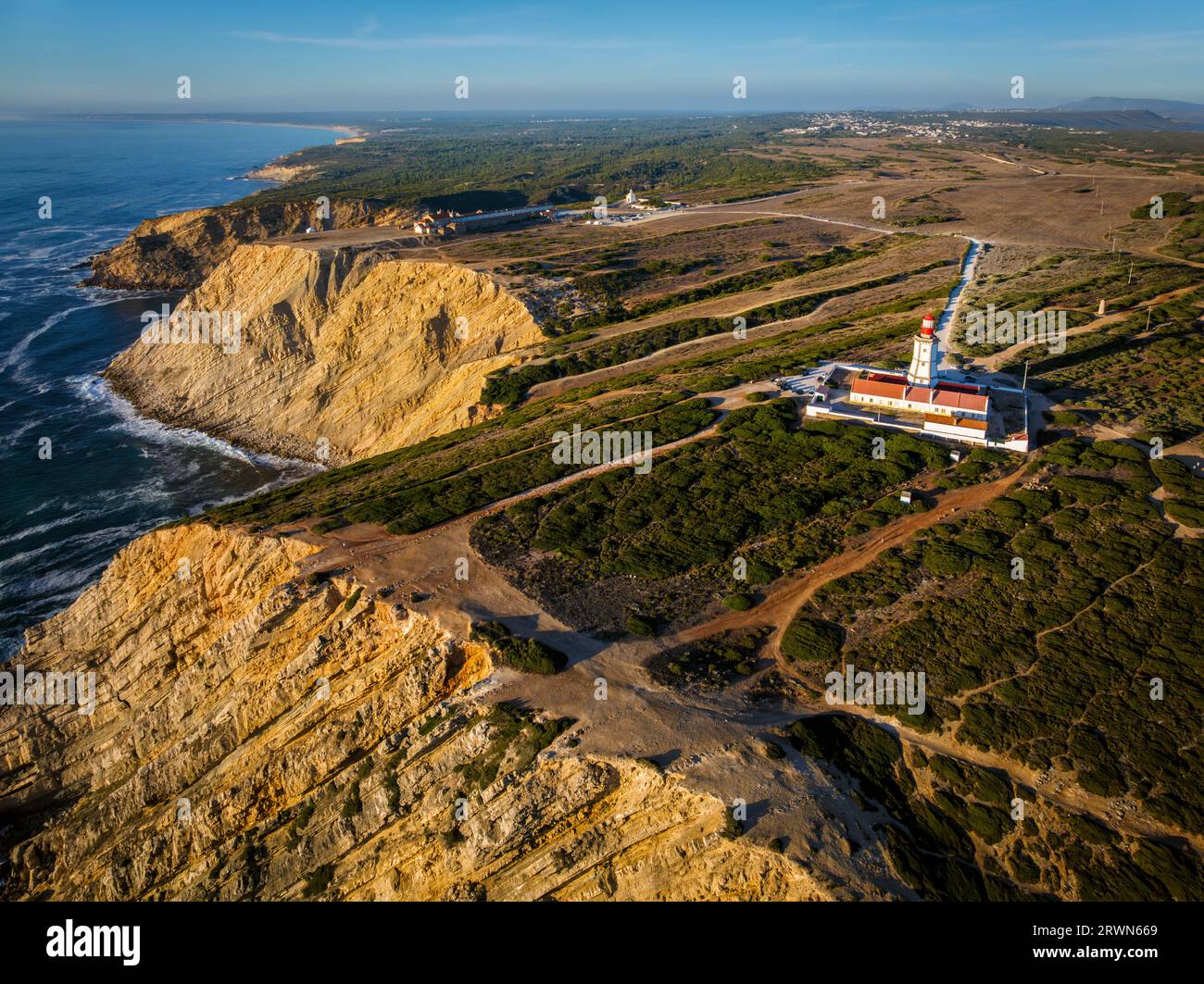 Lighthouse on Cabo Espichel cape Espichel on Atlantic ocean Stock Photo - Alamy