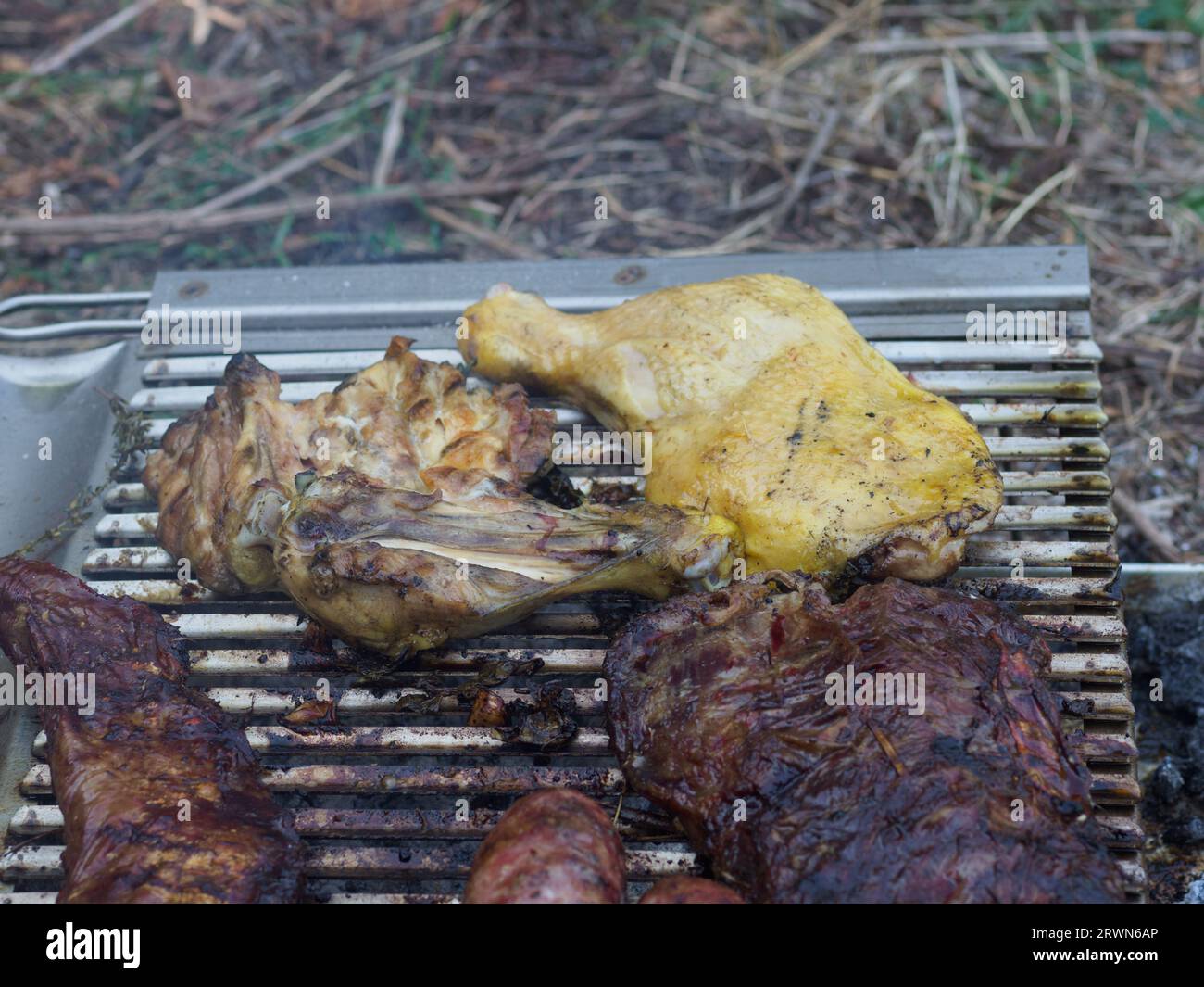 grilling chorizo sausages , chicken quarters, skirt steaks, flank ...