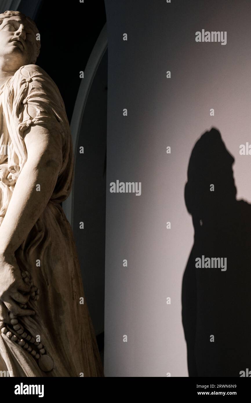 Statue and Shadow Stock Photo - Alamy
