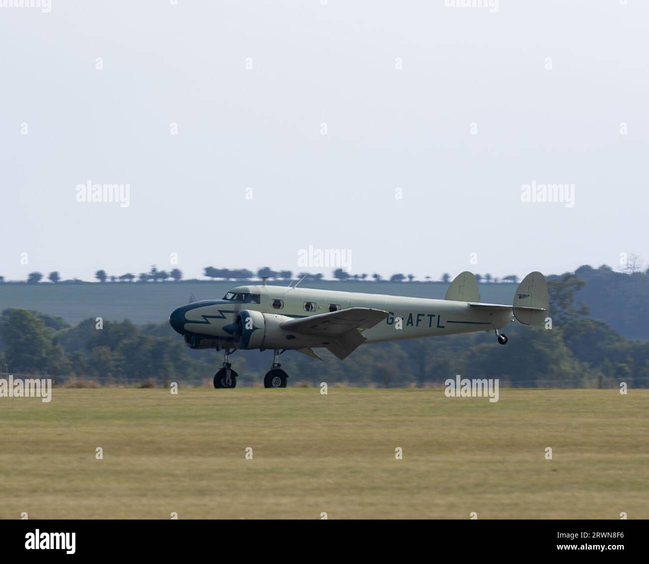 Lockheed 12A 'Electra Junior' G-AFTL flying at the 2023 IWM Duxford ...