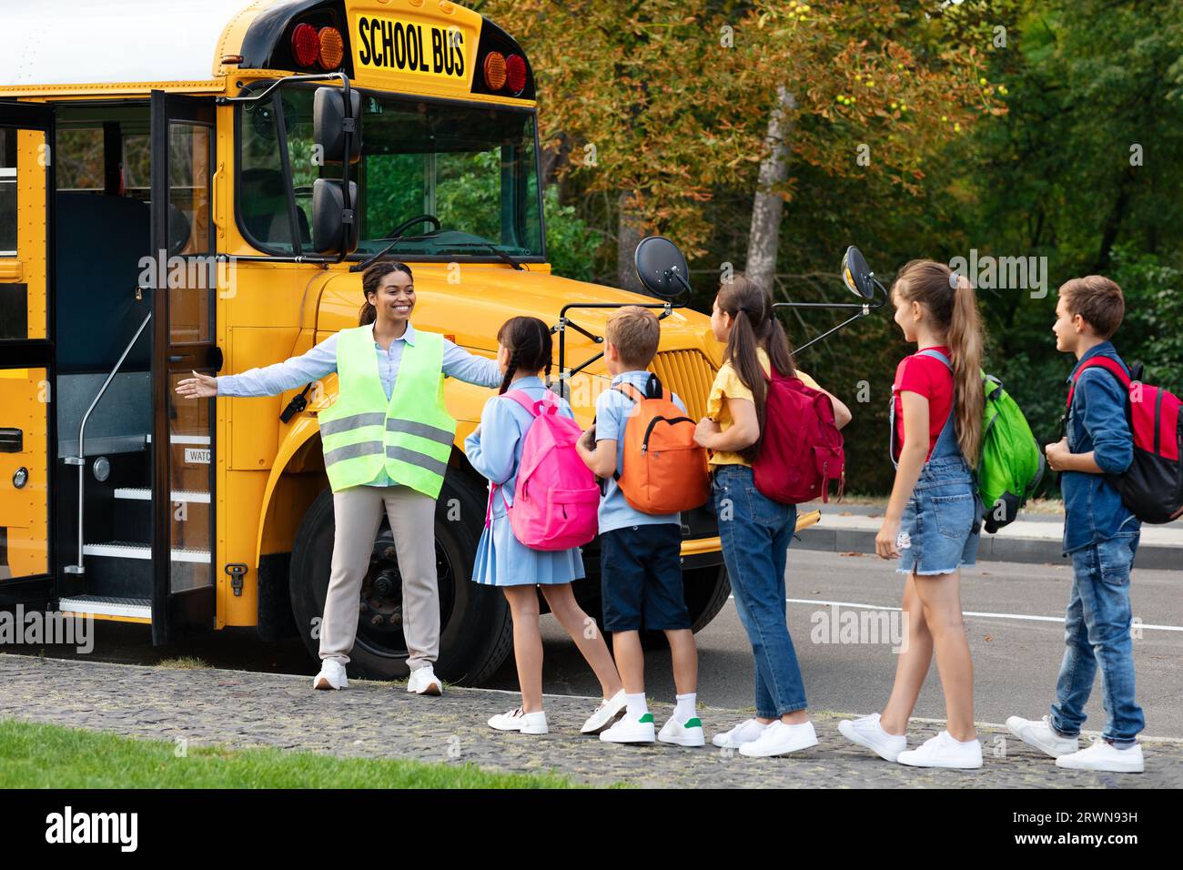 Standing student guiding study group hi-res stock photography and ...