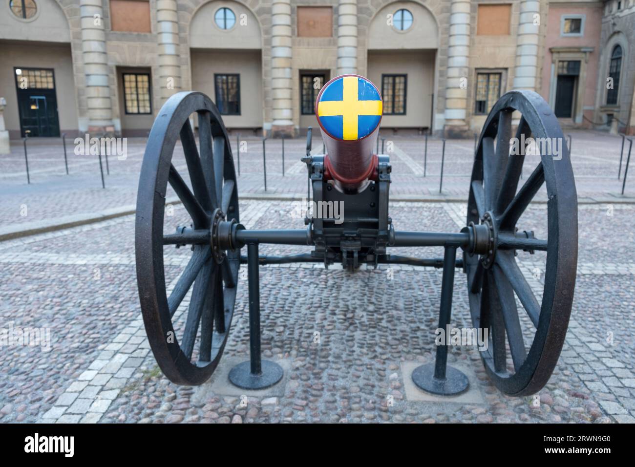 Antiwar concept. One old metal canon covered and closed with Swedish ...