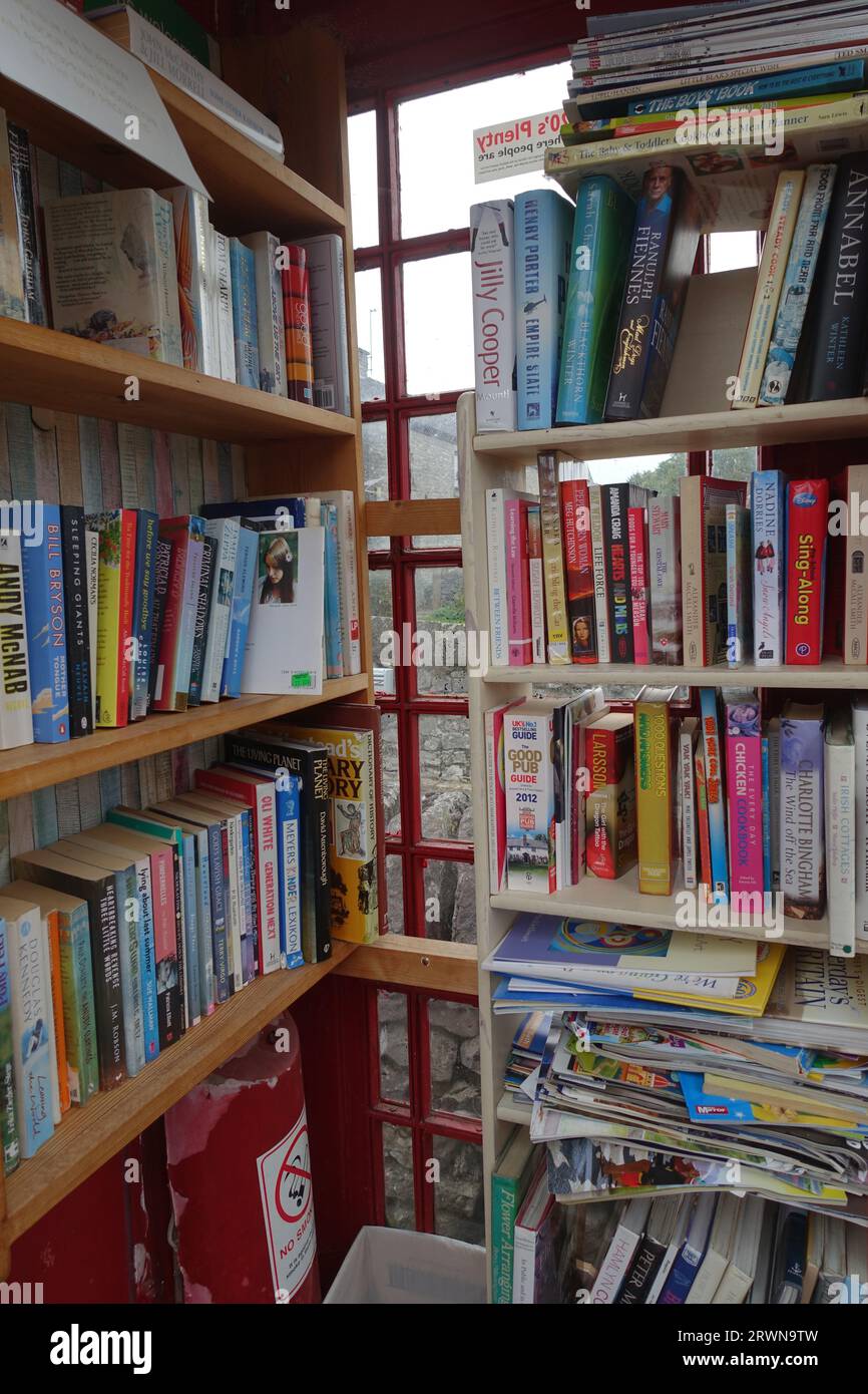 Old telephone box re-purposed as a free community library, Monyash ...