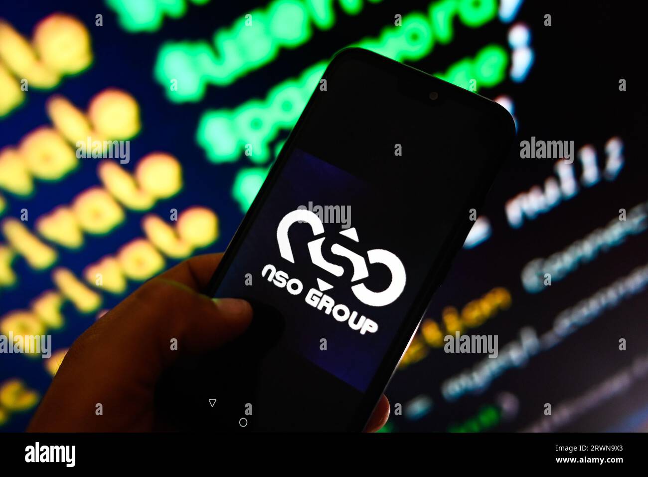 In this photo illustration a NSO Group logo is displayed on a ...