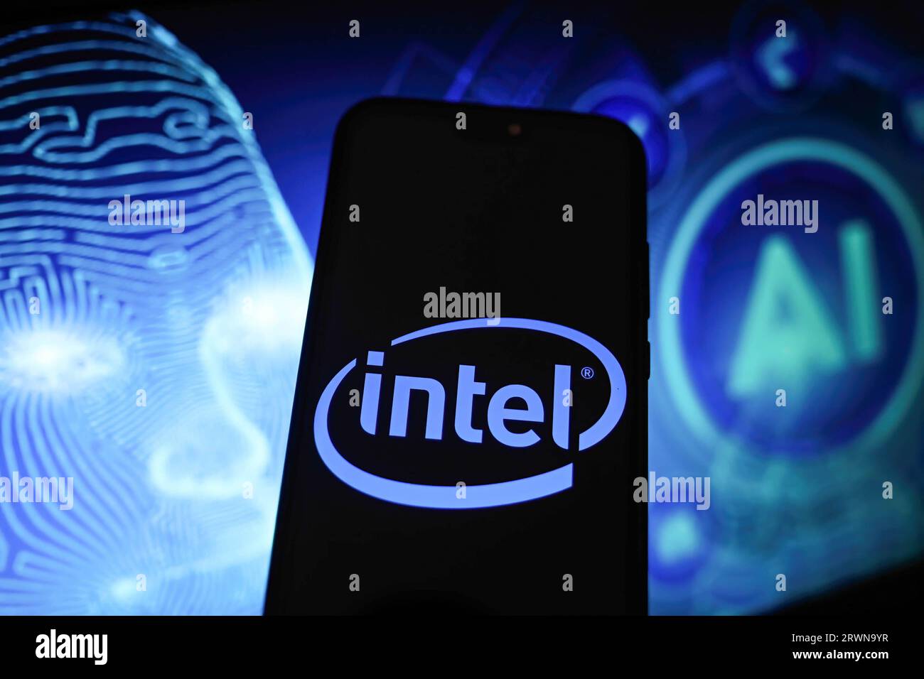 In this photo illustration a Intel logo is displayed on a smartphone ...