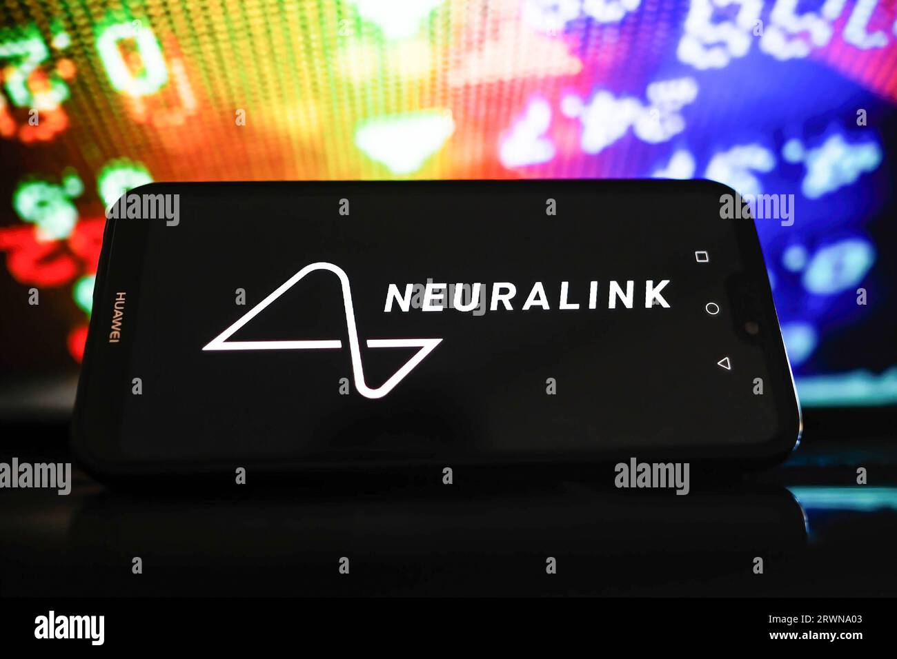 In this photo illustration a NeuraLink logo is displayed on a ...