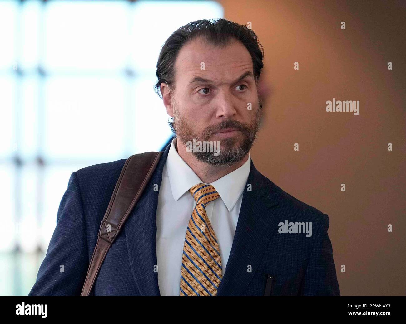 Attorney Reid Elkus walks into the Adams County Justice Center for the ...