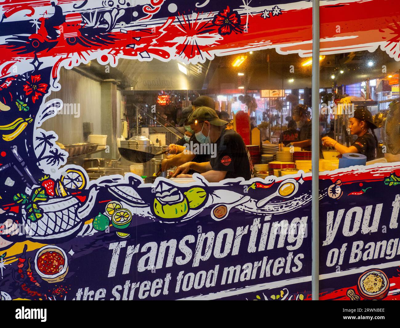 A scene through the window of a street food shop in Leeds city centre ...