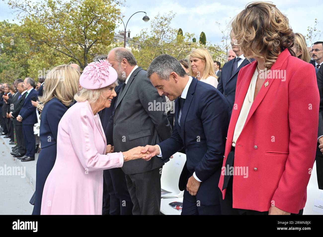 Paris, France. 20th Sep, 2023. Britain's Queen Camilla shakes hands with Gerald Darmanin after ...