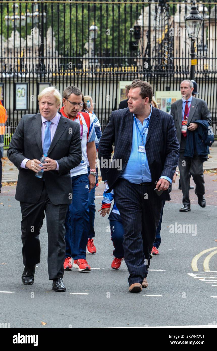 Boris Johnson with Team GB Olympians leaving Buckingham Palace after ...