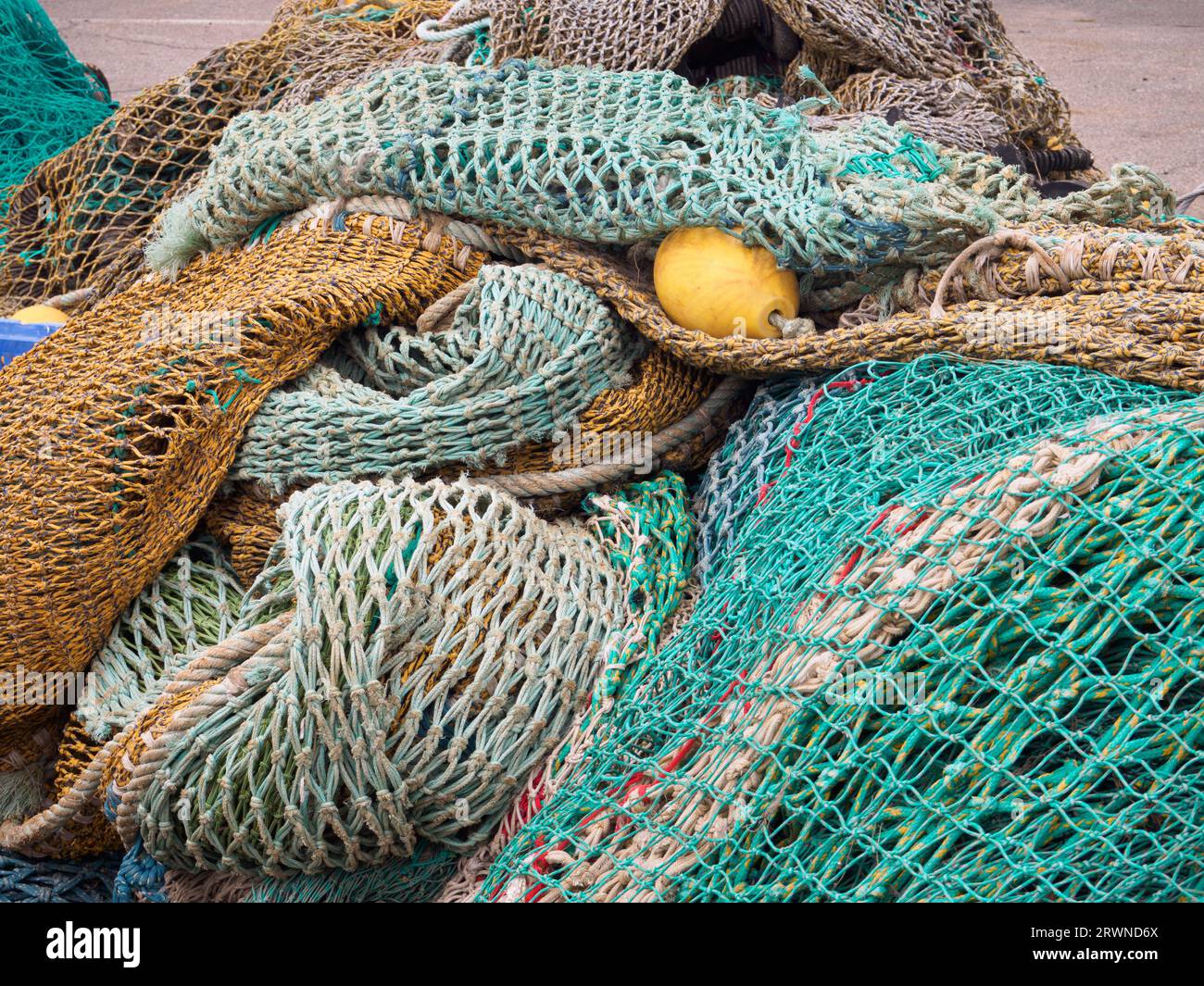 Fishing nets on the quayside at La Turballe, Brittany Stock Photo - Alamy
