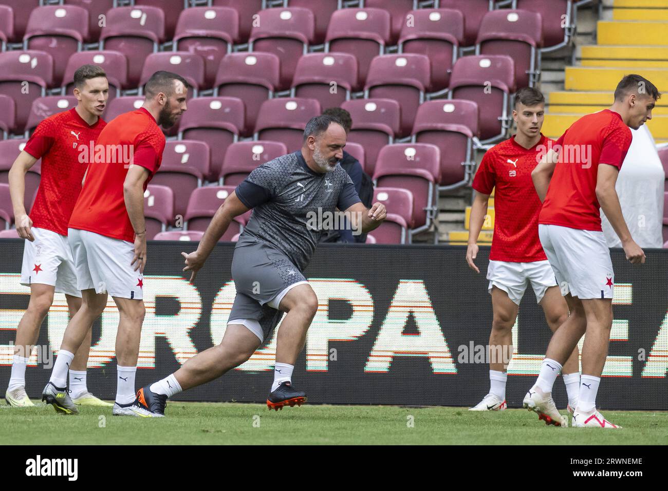 Jindrich Trpisovsky, center, head coach of SK Slavia Prague, runs ...