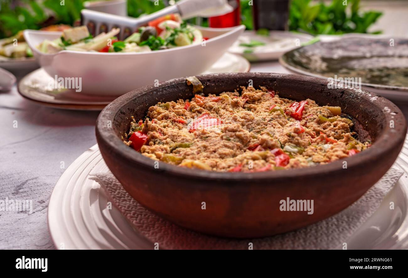 Traditional Albanian food known as Fergese, made with red bell pepper ...