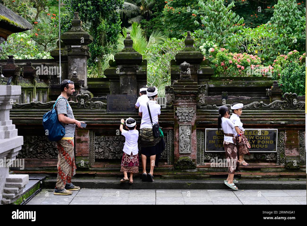 The beautiful Pura Tirta Empul water temple near Ubud, Bali, attracts ...