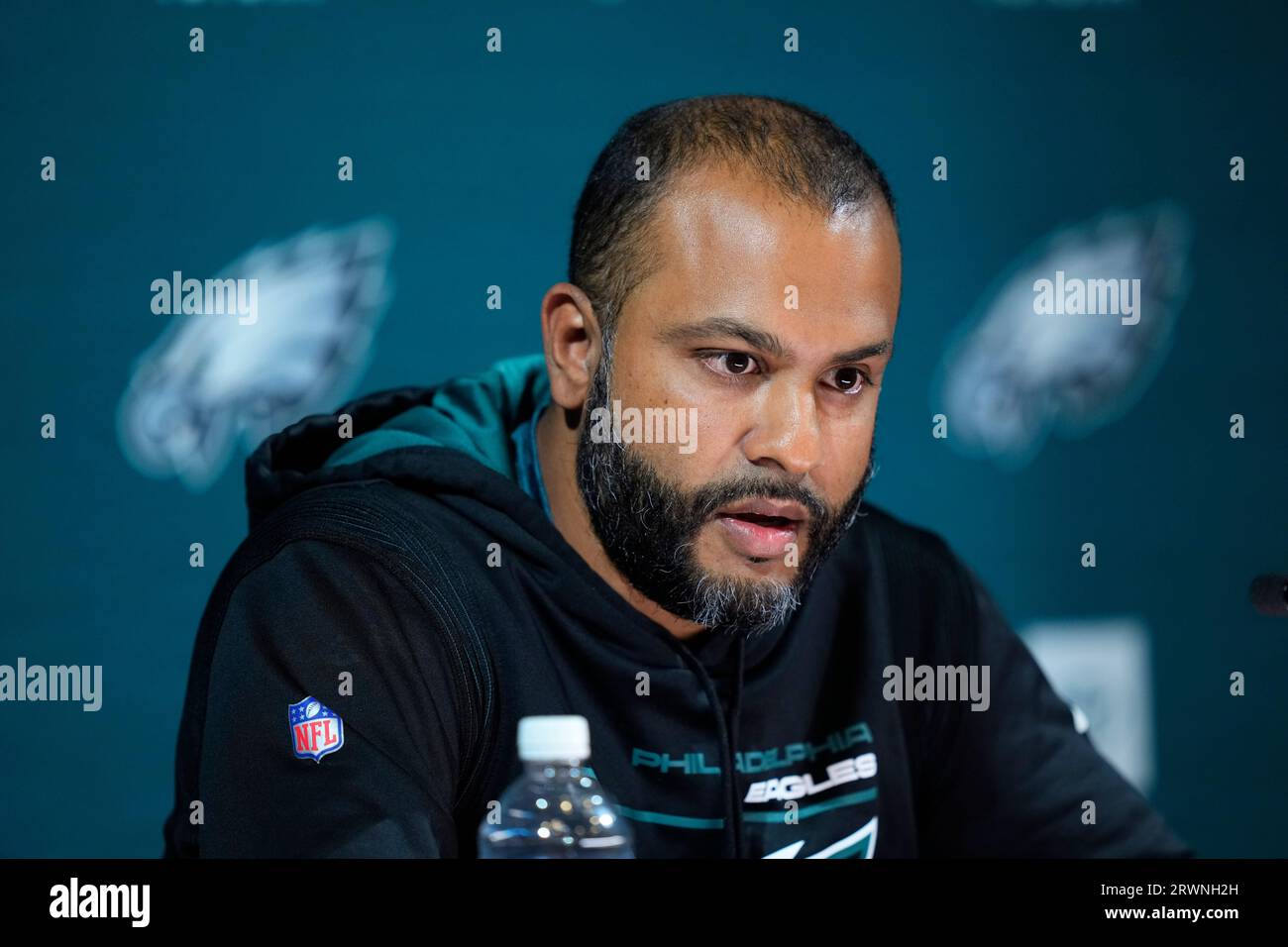 Philadelphia Eagles defensive coordinator Sean Desai speaks with ...