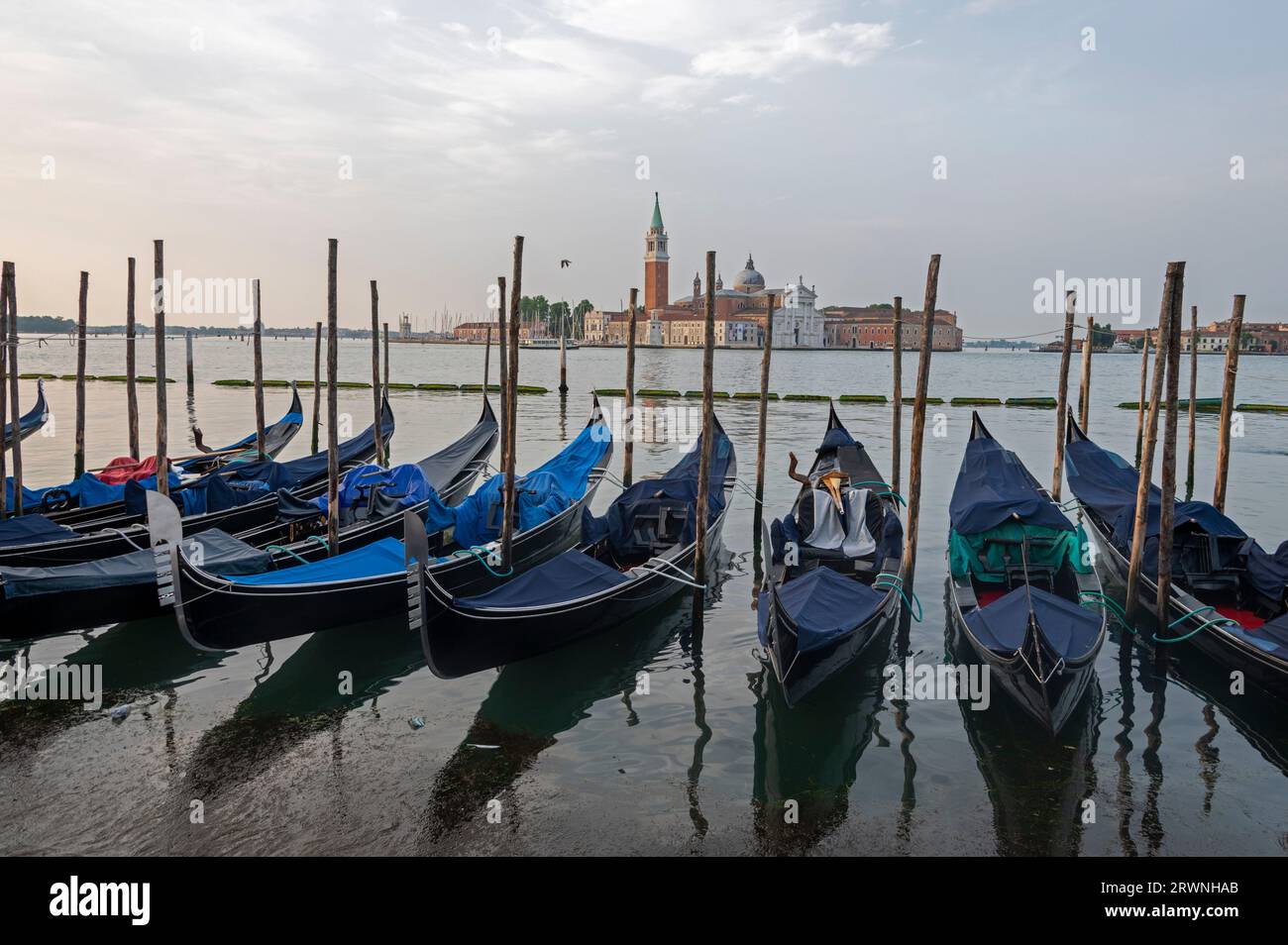 Across the lagoon from Piazza San Marco ( St.Mark’s Square)at dawn, is ...