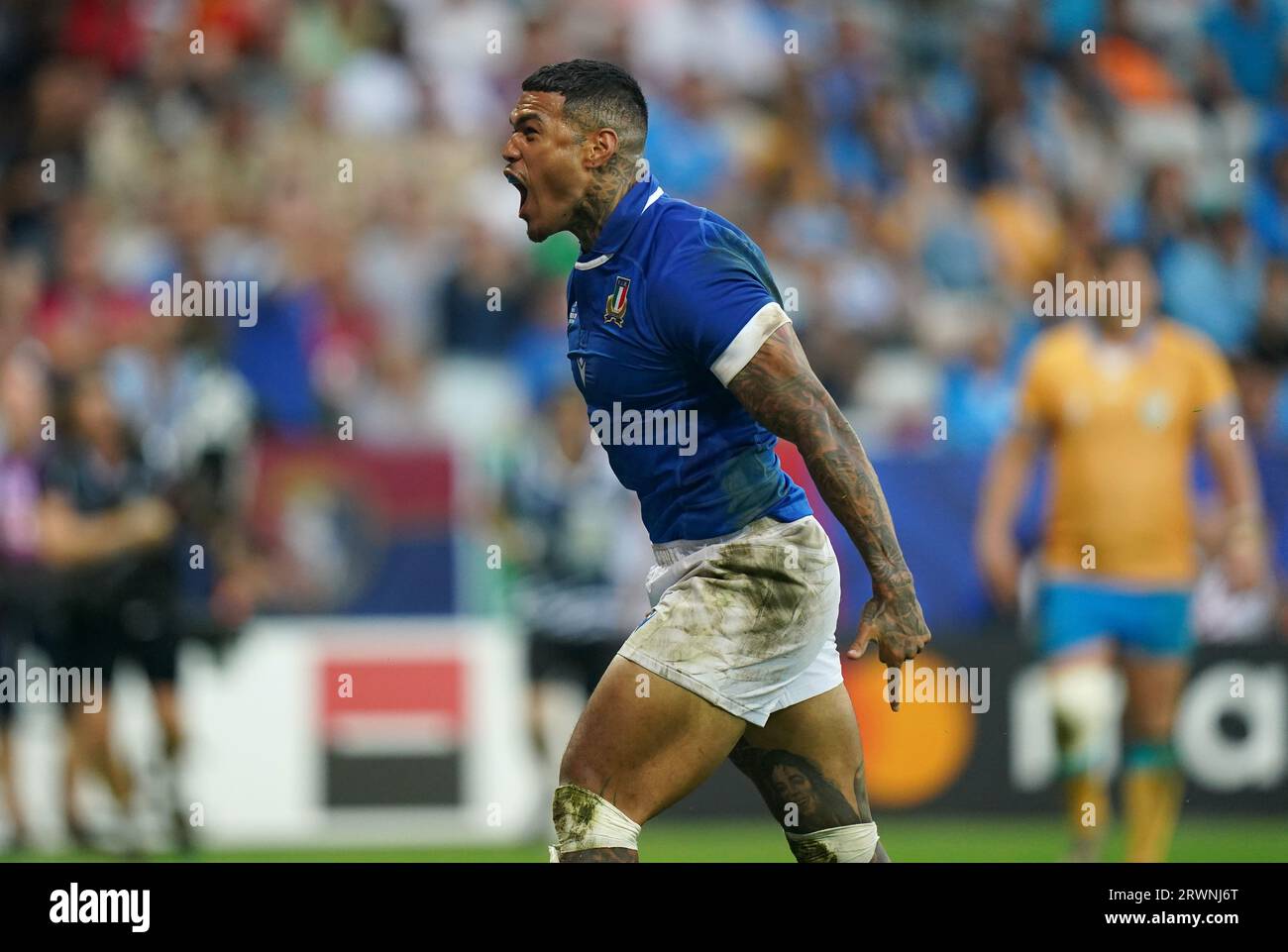 Italy's Monty Ioane celebrates scoring their third try during the Rugby ...
