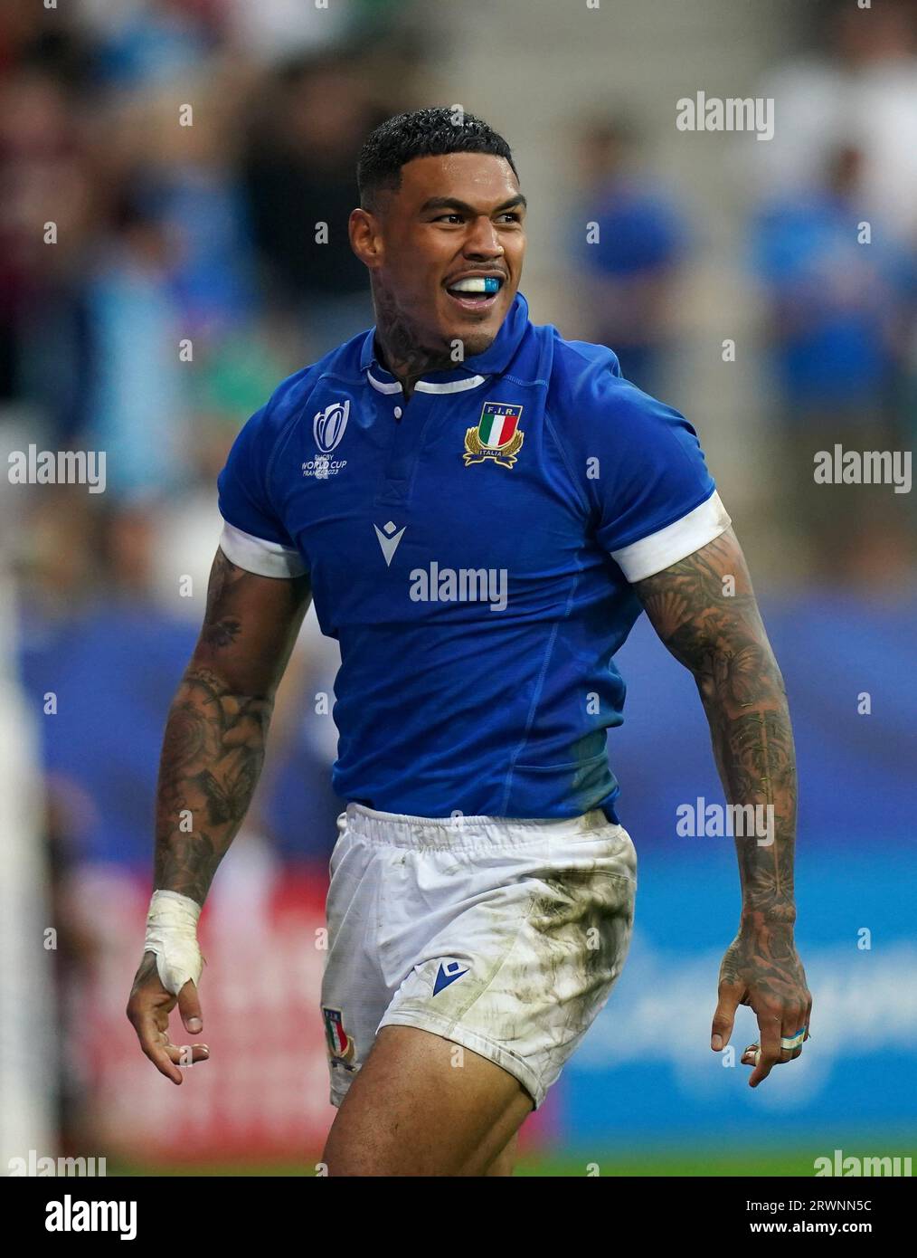 Italy's Monty Ioane celebrates scoring their third try during the Rugby ...
