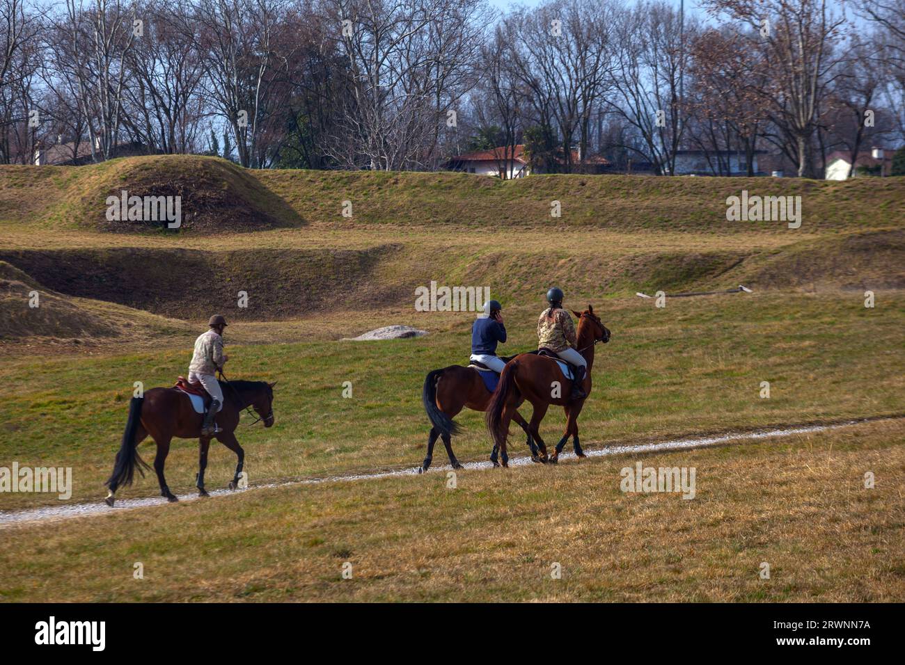 Horseback riders gracefully explore Palmanova's bastions, blending ...