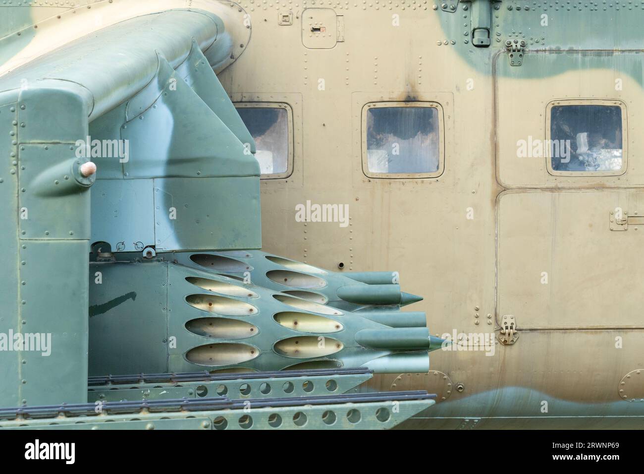 Old Soviet-made camouflage Mi-24 military helicopter rocket pods Stock ...