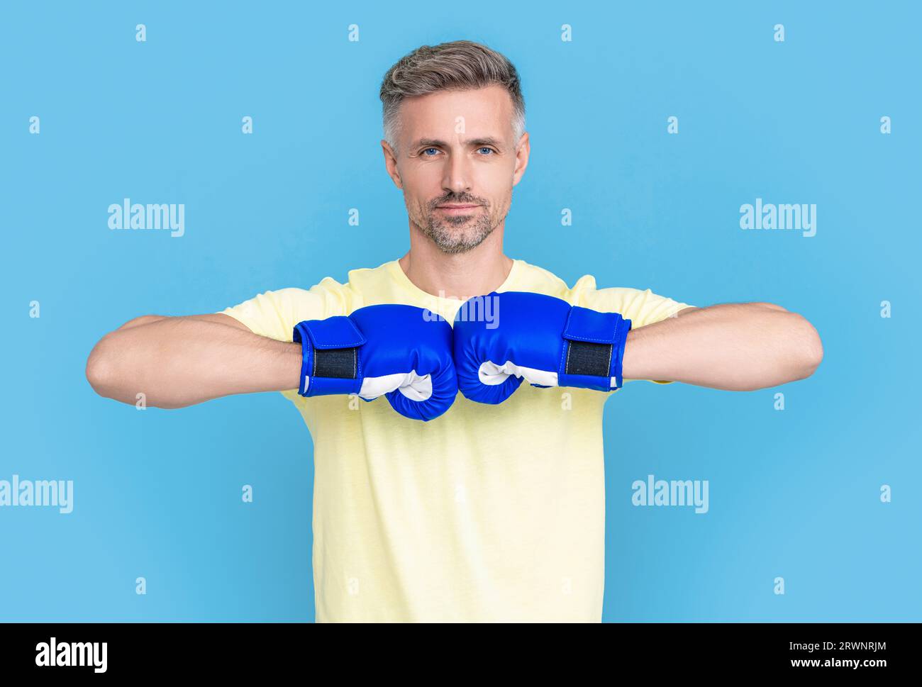 man boxer fighter in sport boxing gloves on background. photo of man ...